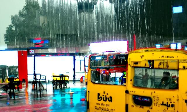 A busy bus station in the rain - AI Generated Artwork - NightCafe Creator