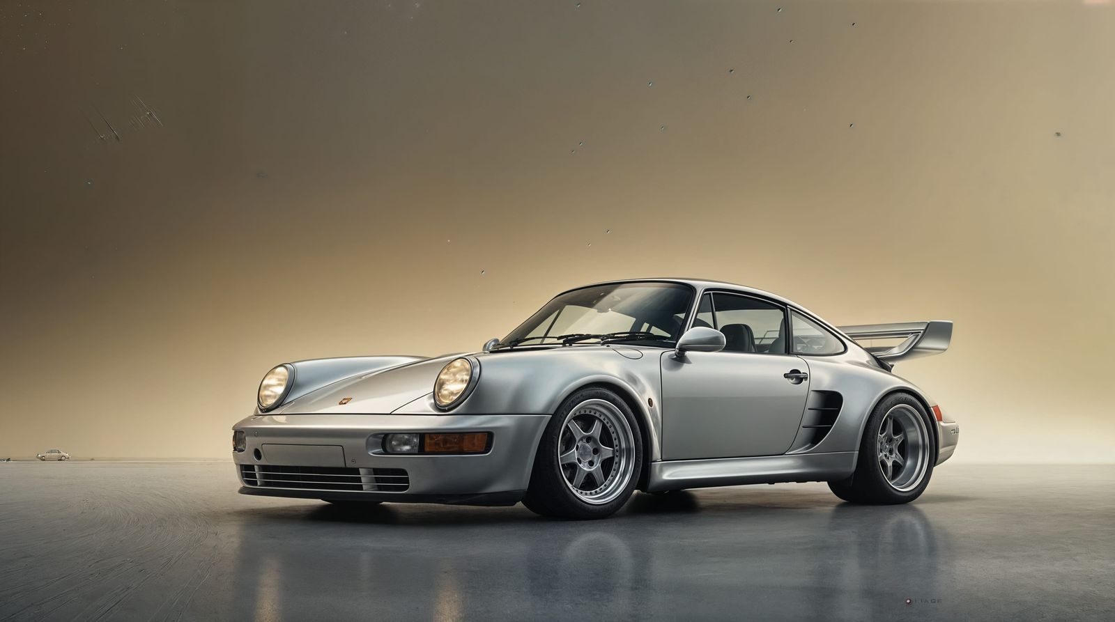 A sleek, silver Porsche 964 Turbo - A sleek, silver Porsche ...