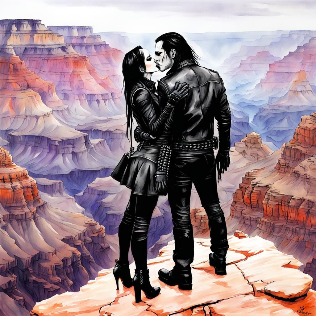 Beautiful goth couple kissing at grand canyon