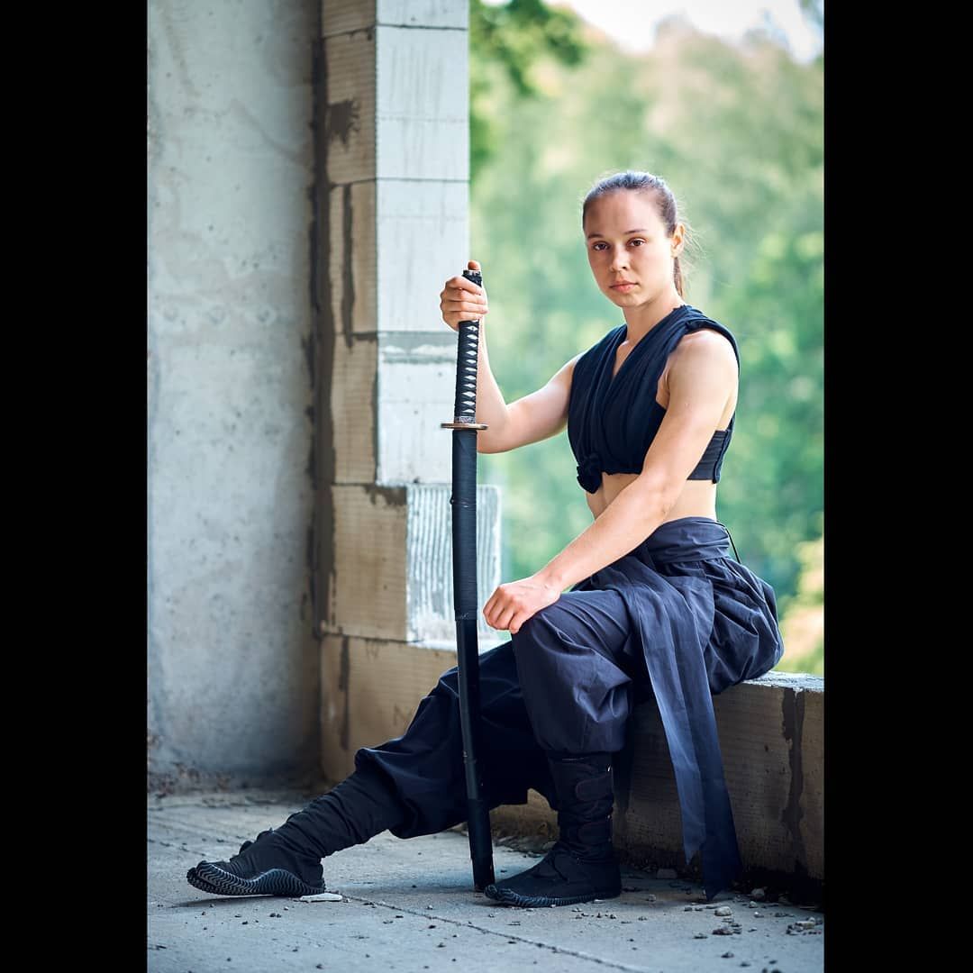 A girl resting with her sword - Ninja Girl Resting with Swor...